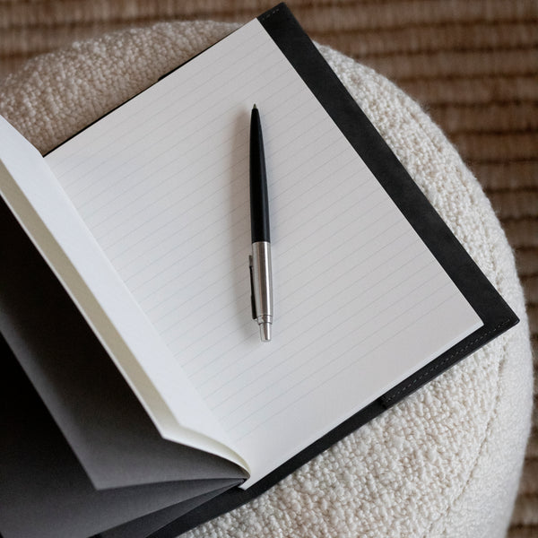 Notebook in black leather | August Sandgren